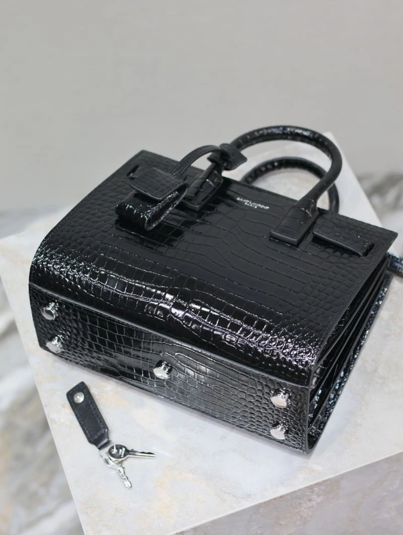 Value-priced YSL Top Handle Bags