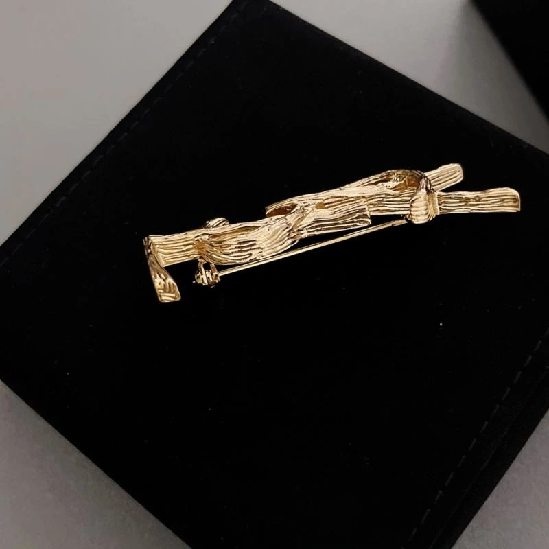 Indistinguishable Ysl Brooches