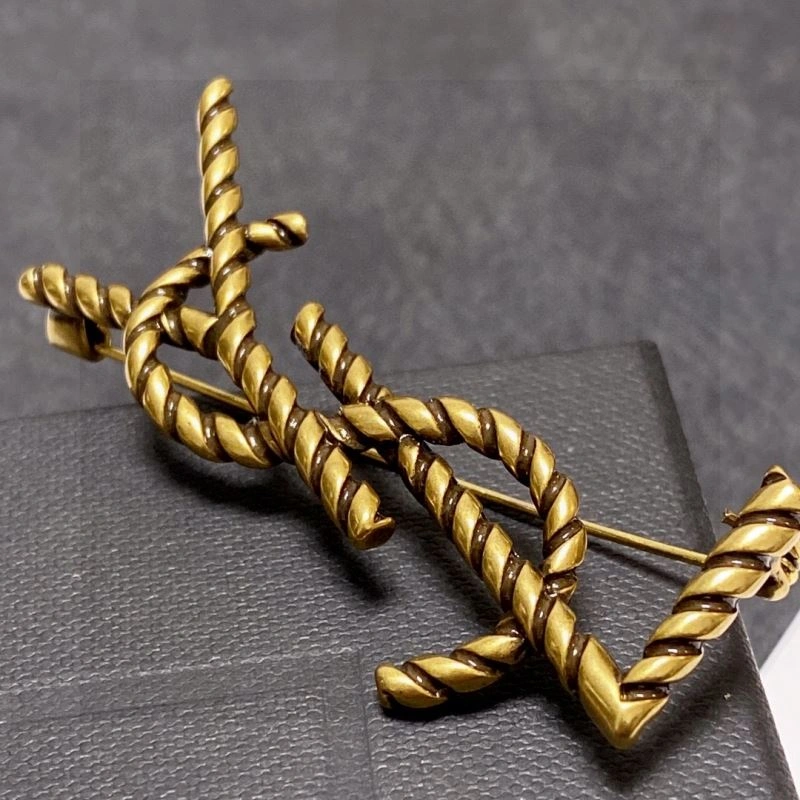 Top mirror Ysl Brooches