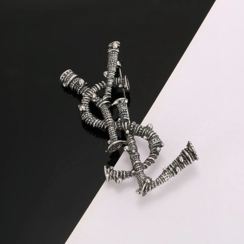 Ysl Brooches